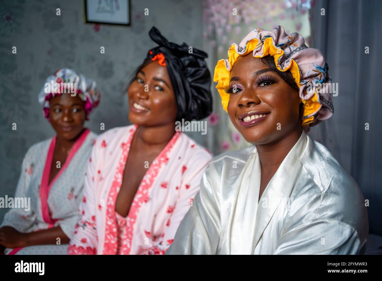 Happy women in dressing hi-res stock photography and images - Alamy