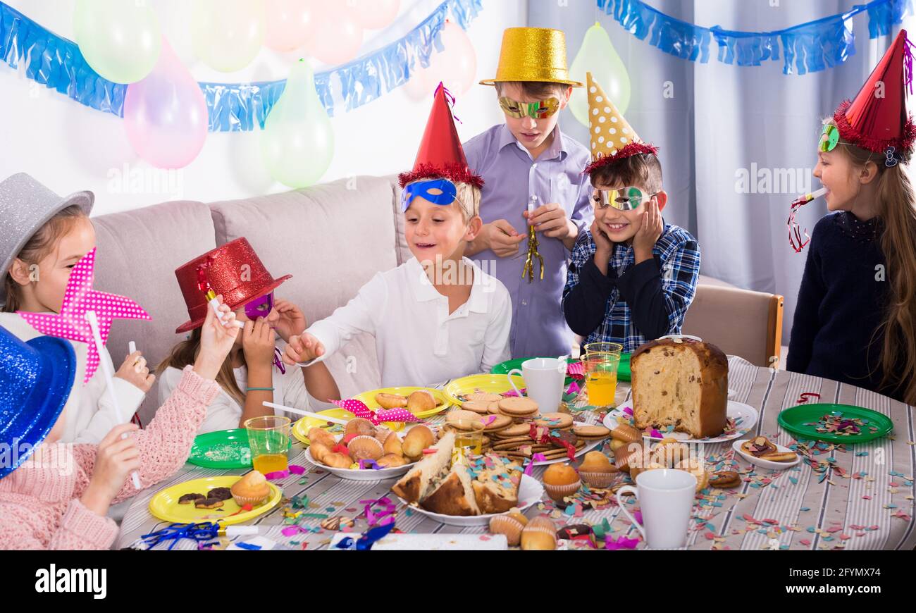 happy kids having good time during friend’s birthday party Stock Photo ...