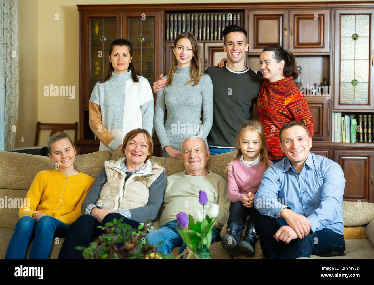 Portrait of a happy family of three generations Stock Photo - Alamy