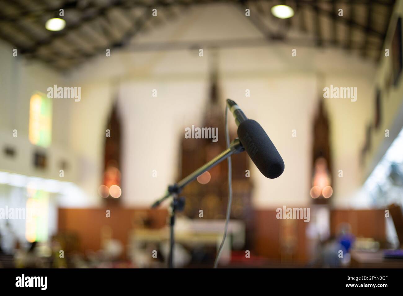 microphone in blurred church background. voice of church Stock Photo ...