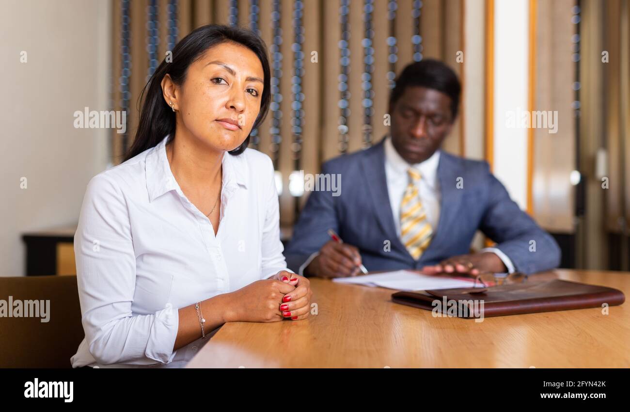 Angry boss blowing up female subordinate for mistakes in work Stock ...