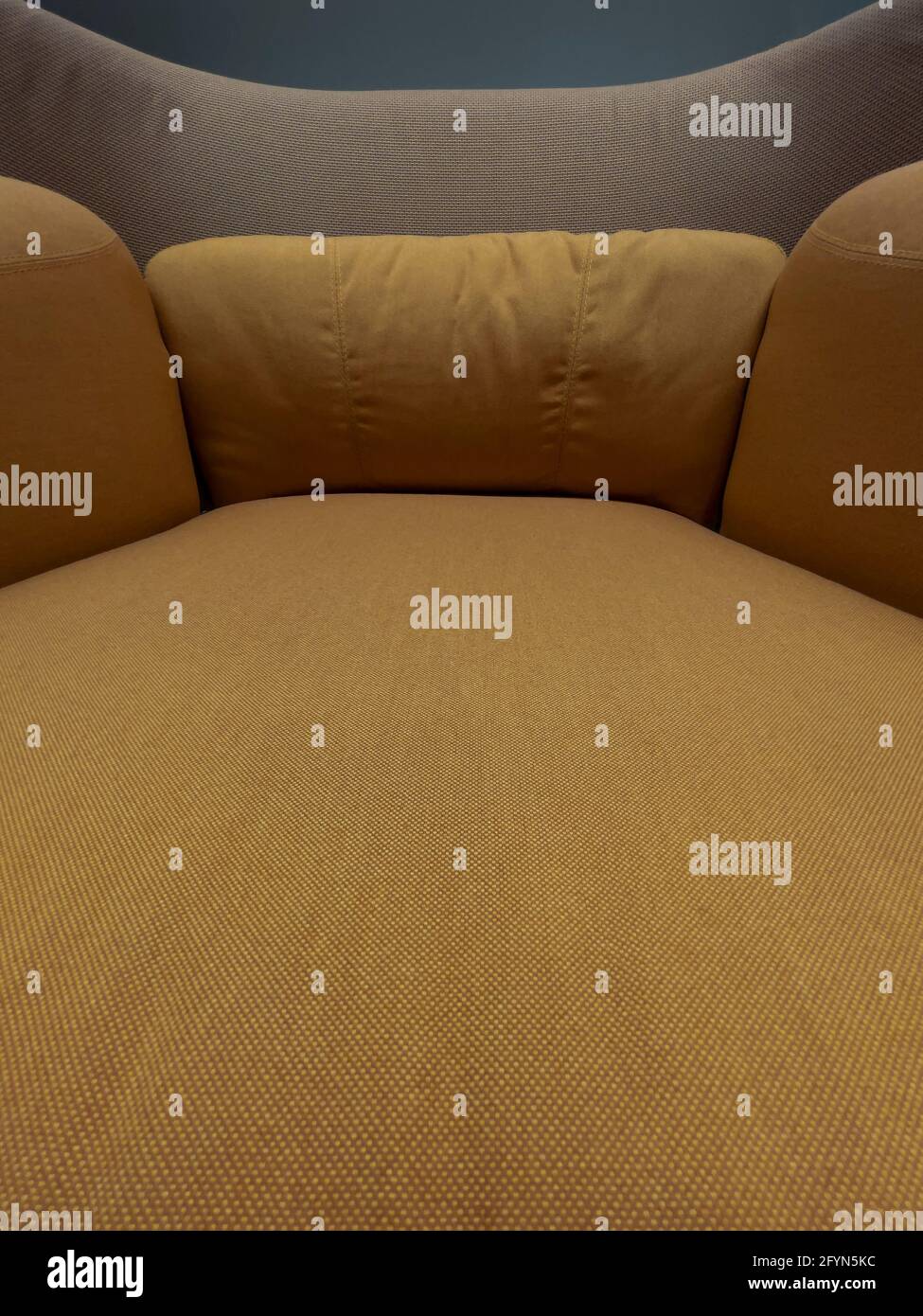 Abstract background image of a sofa bed in beige color Stock Photo - Alamy