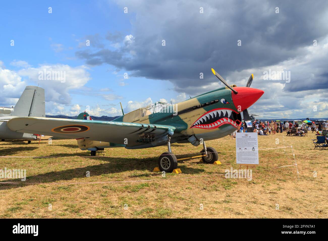 A WWII era Curtiss P-40E Kittyhawk fighter, painted in the colors of ...