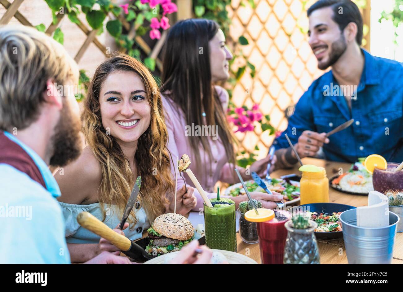 Happy friends lunching with healthy food in bar coffee brunch - Young ...