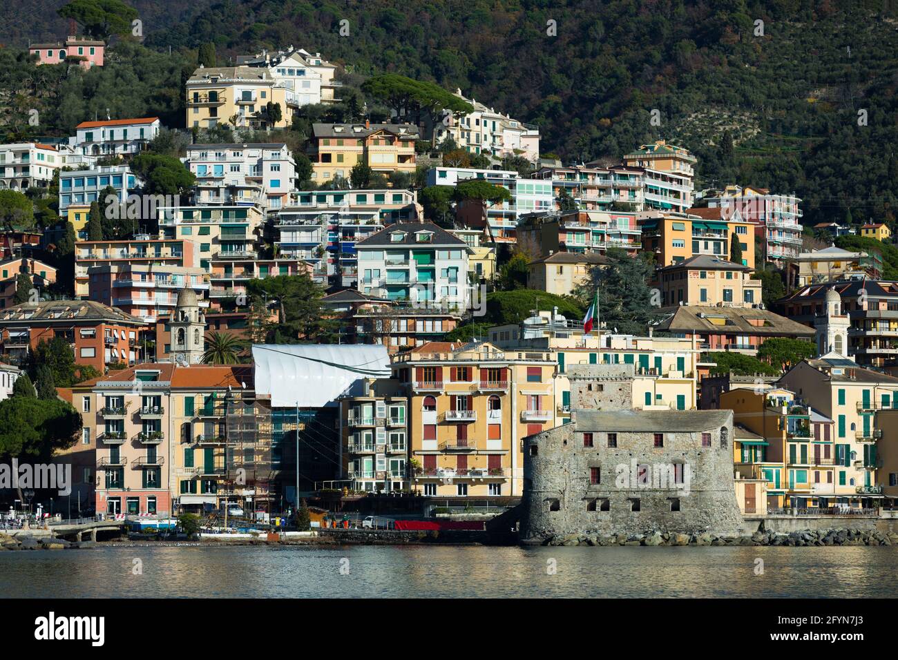 Landscape of Italian town of Rapallo with castle on Ligurian seaside ...