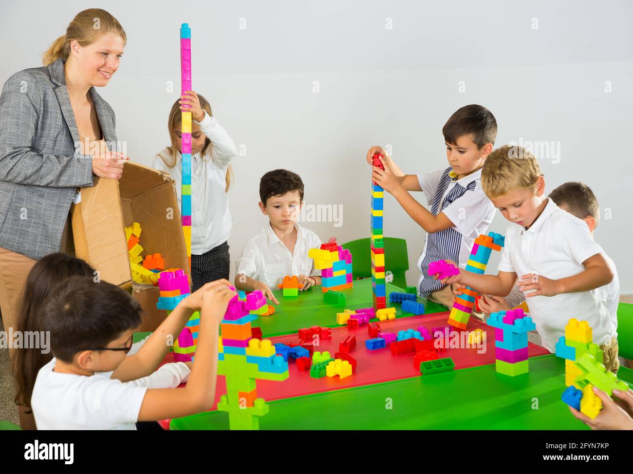 Kids playing with blocks in classroom hi-res stock photography and ...
