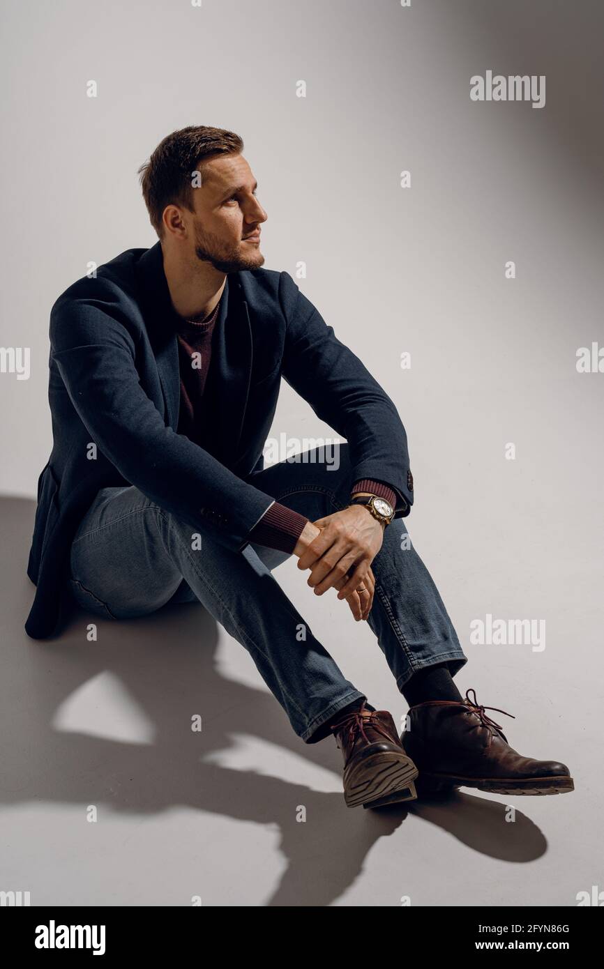 Male Fashion Model Sitting