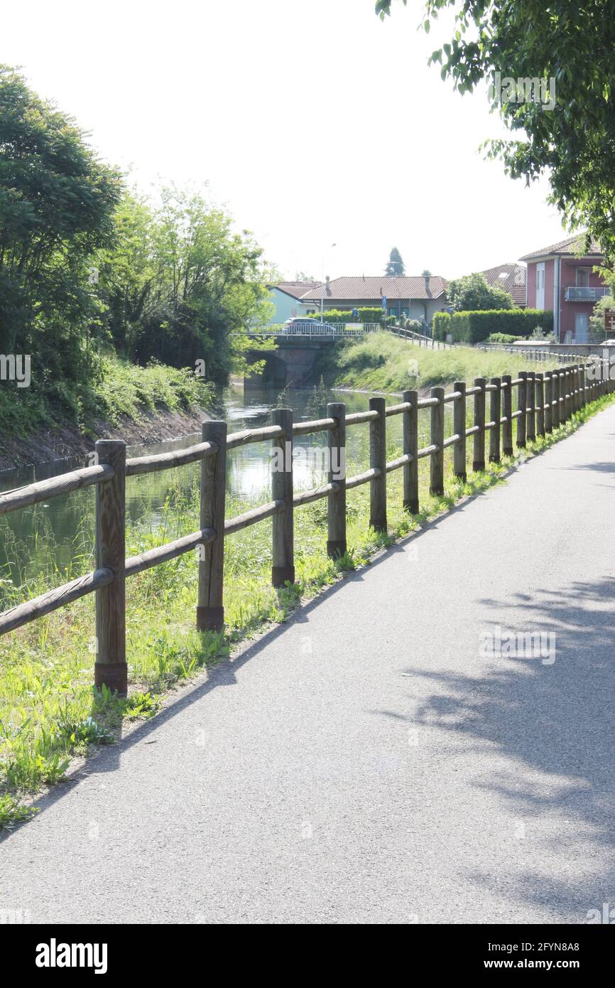 Bike path - Embankment water canal in nature Stock Photo - Alamy