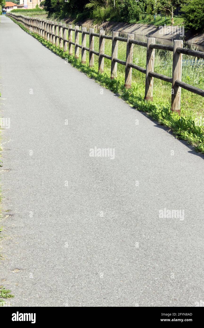 Bike path - Embankment water canal in nature Stock Photo - Alamy