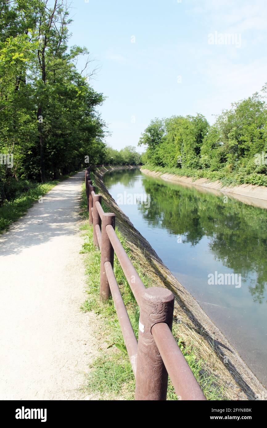 Bike path - Embankment water canal in nature Stock Photo - Alamy