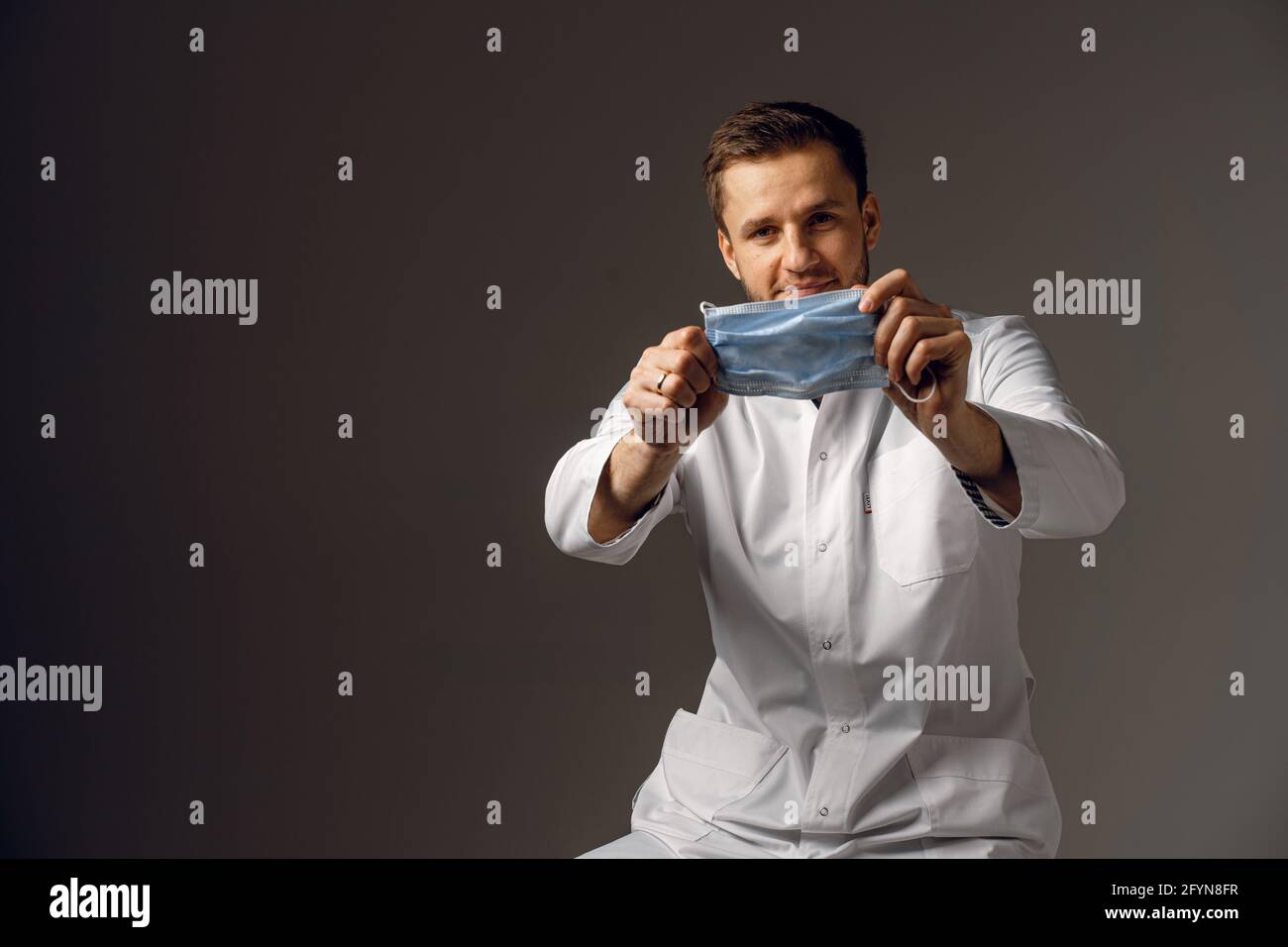Doctor in medical mask for protection against covid-19. Advices for ...
