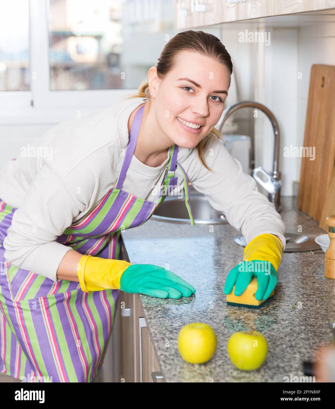 Female is caring about clean of kitchen at her house Stock Photo - Alamy