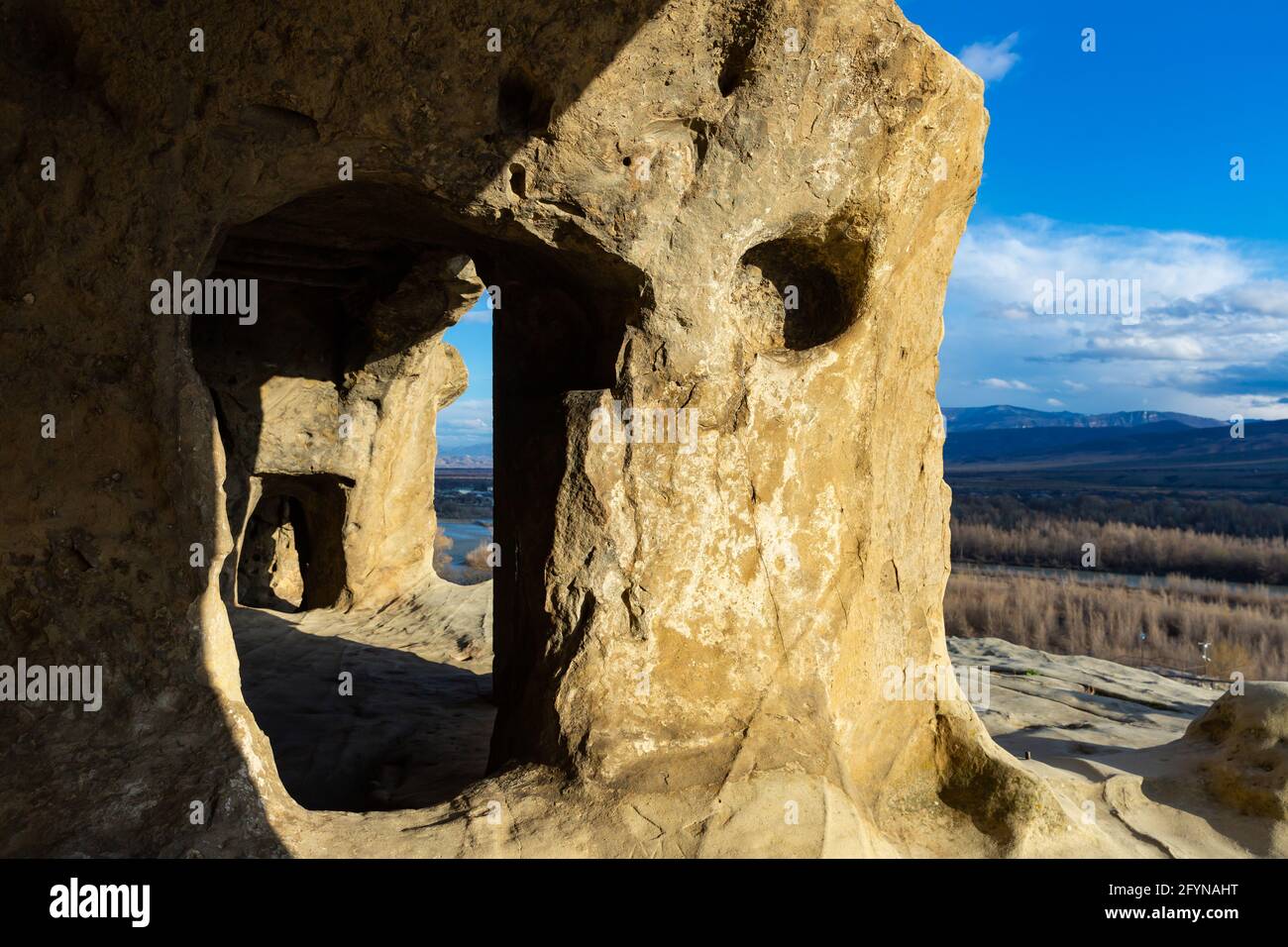 Complex of cave structures carved into mountain in historic city of ...