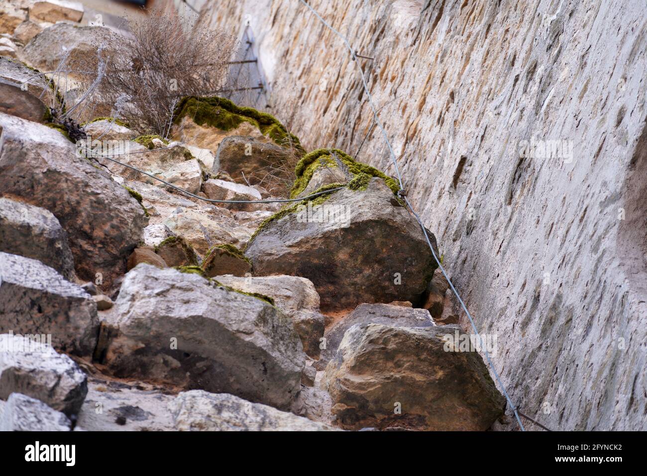Rocks and cliff covered in green moss Stock Photo - Alamy
