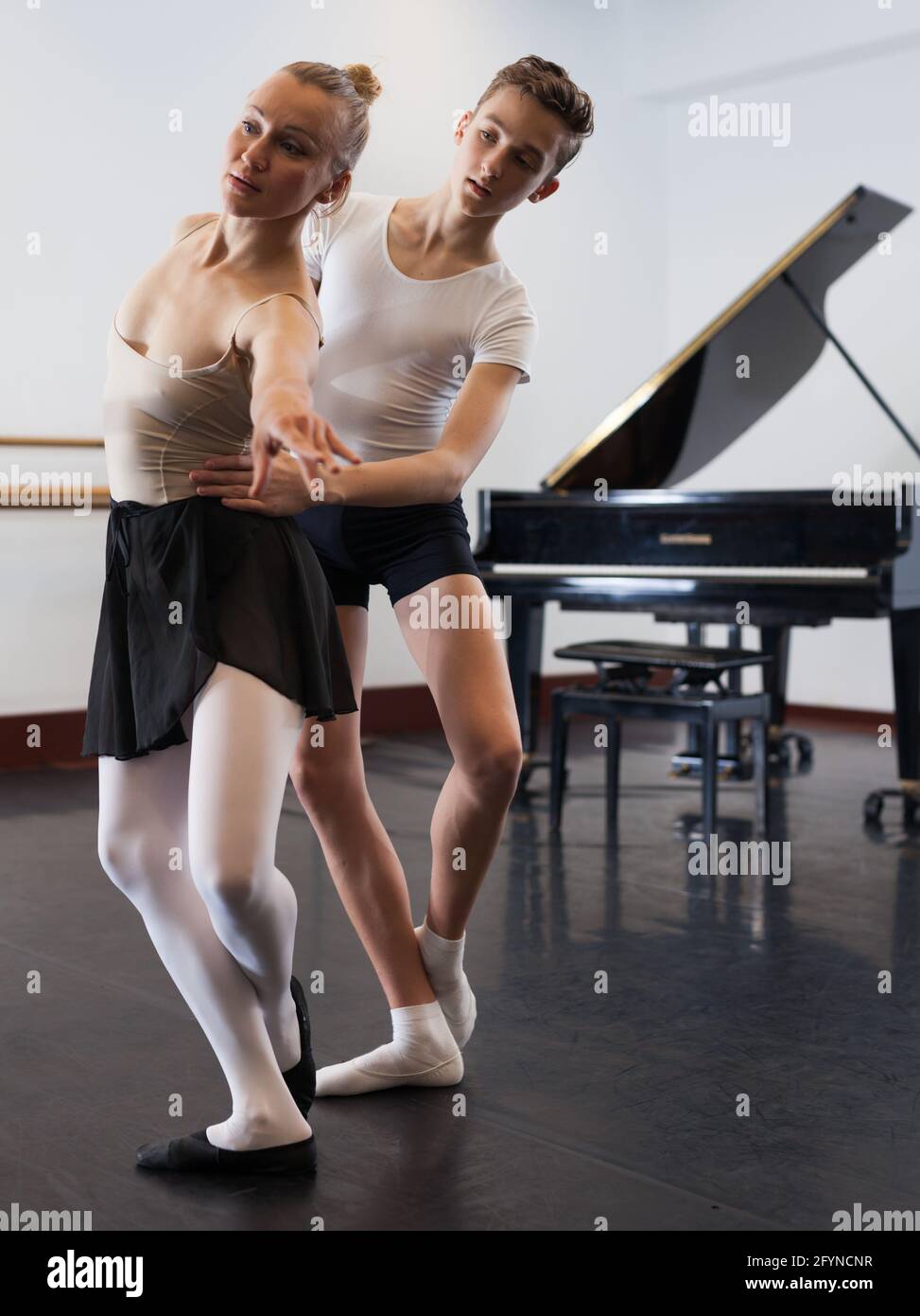 Two modern ballet dancers in the ballet studio Stock Photo - Alamy