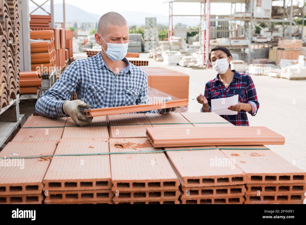 Builder mask bricks hi-res stock photography and images - Alamy