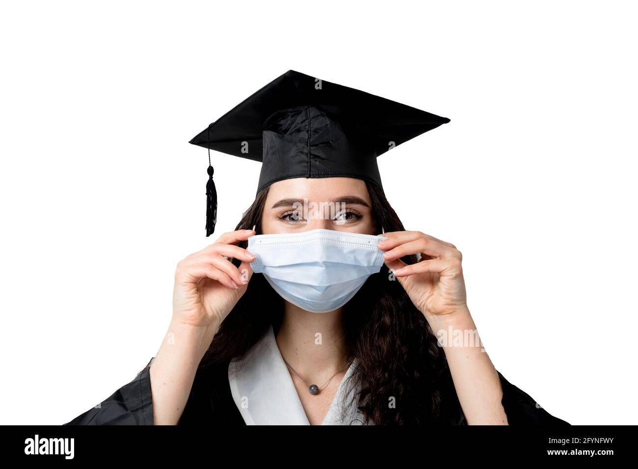 Graduate girl in medical mask at coronavirus covid-19 period. Woman ...