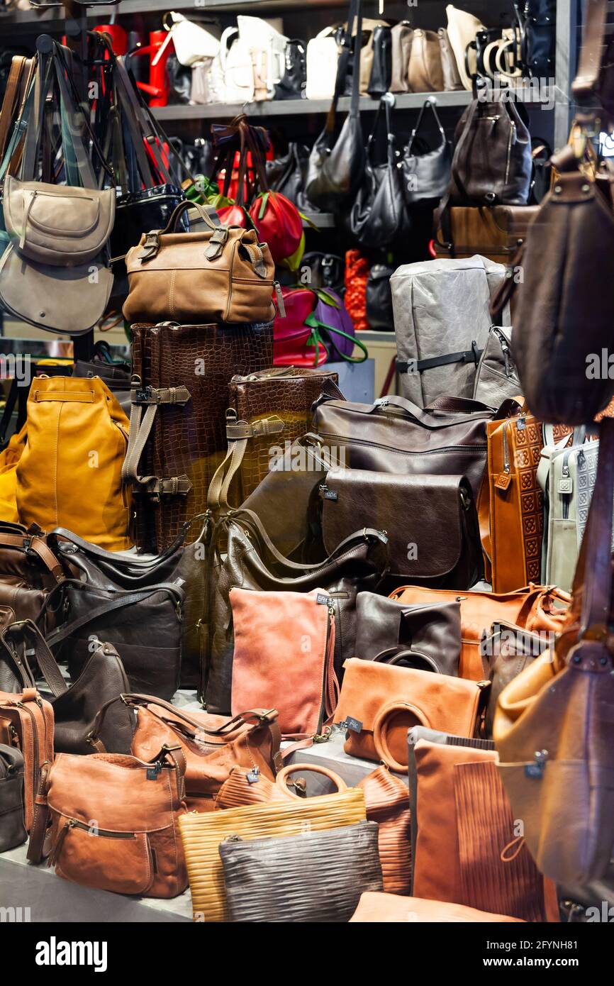 Handmade leather bags and backpacks in european shop Stock Photo - Alamy