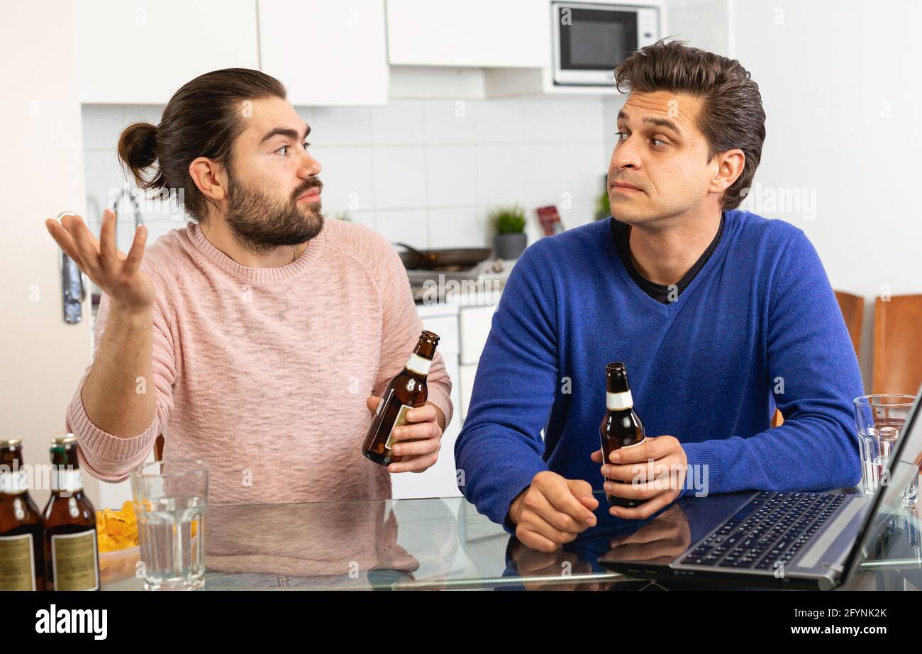 Two Male Friends Talking