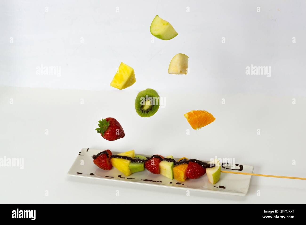 Suspended red apple hi-res stock photography and images - Alamy