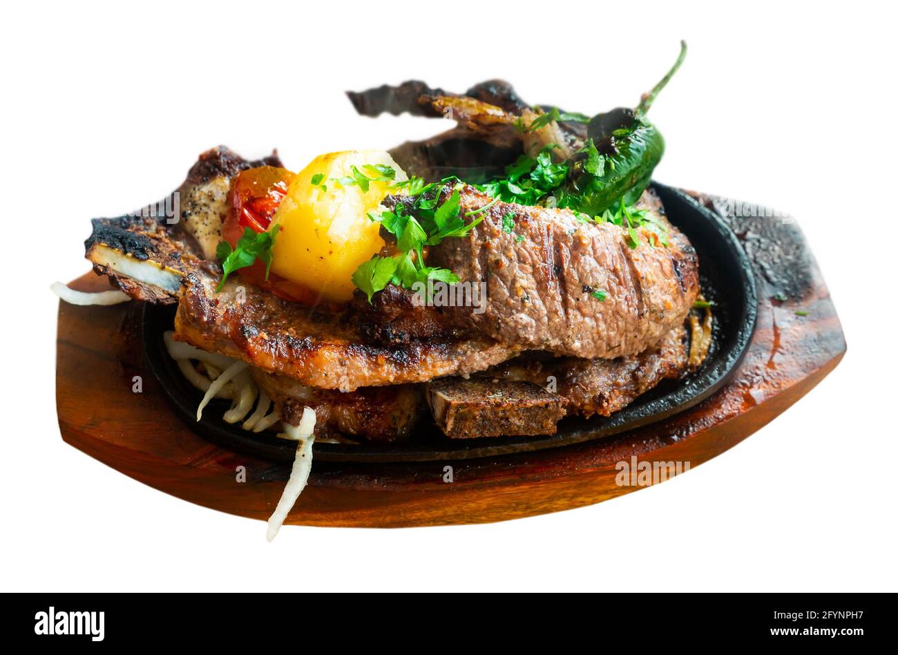 Fried beef with vegetables on a traditional ceramic plate. Isolated ...