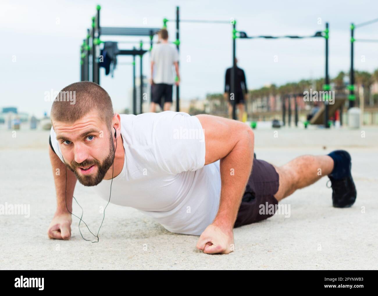 Strong man performs muscle ups hi-res stock photography and images - Alamy