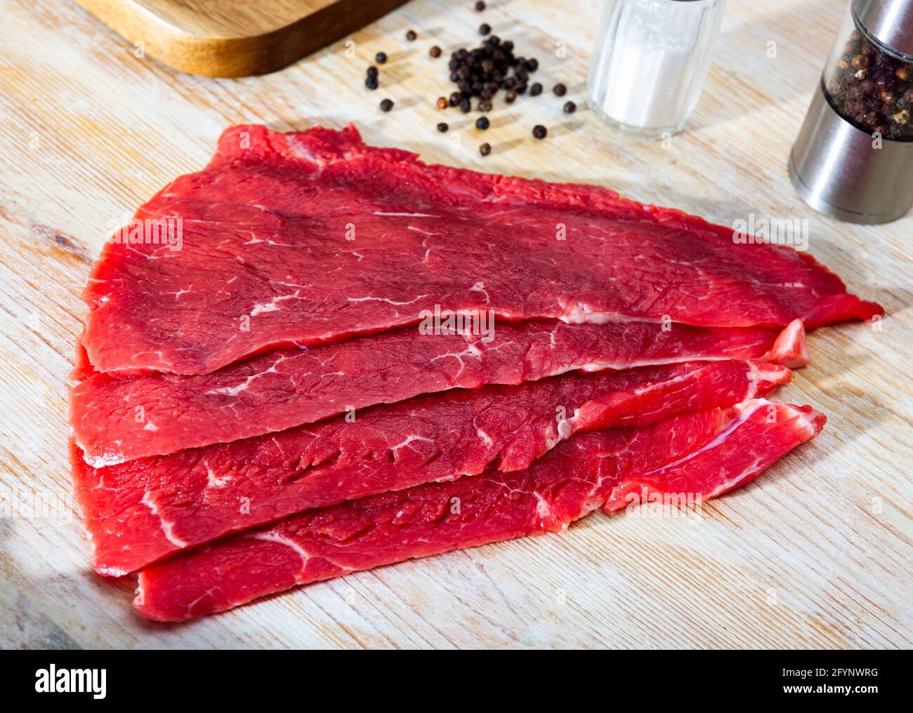 Image of a juicy raw beef fillet cut into pieces Stock Photo - Alamy