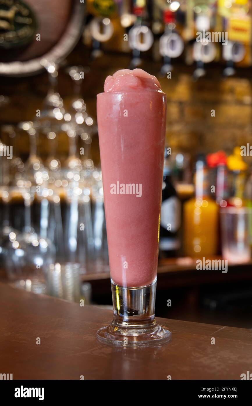 A clean photo of a Raspberry Daiquiri, prefessionally made in an Irish ...