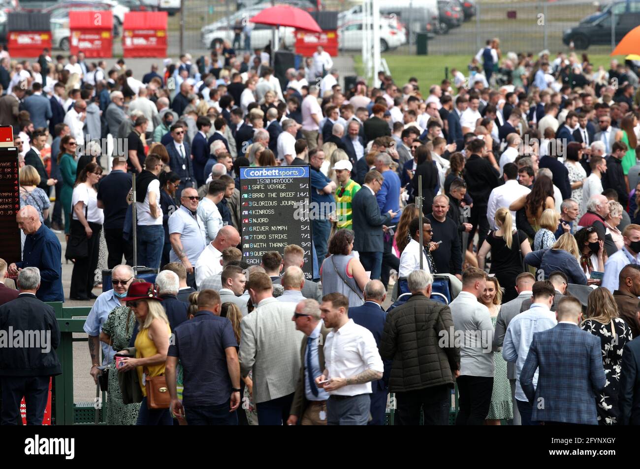 A view of spectators and bookmakers at Haydock Park Racecourse in ...