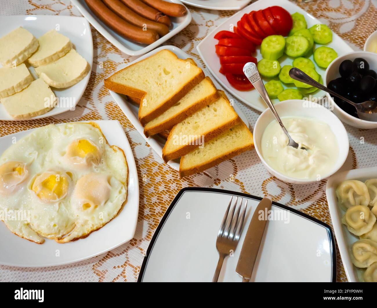 Rich and delicious Georgian breakfast on hotel table without people ...