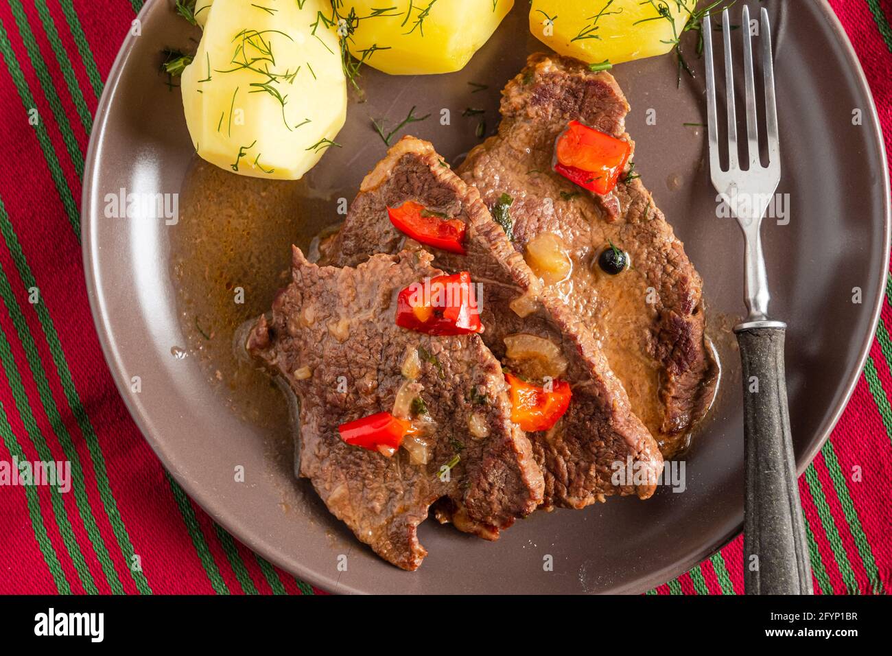 Homemade braised beef with gravy and potatoes Stock Photo - Alamy