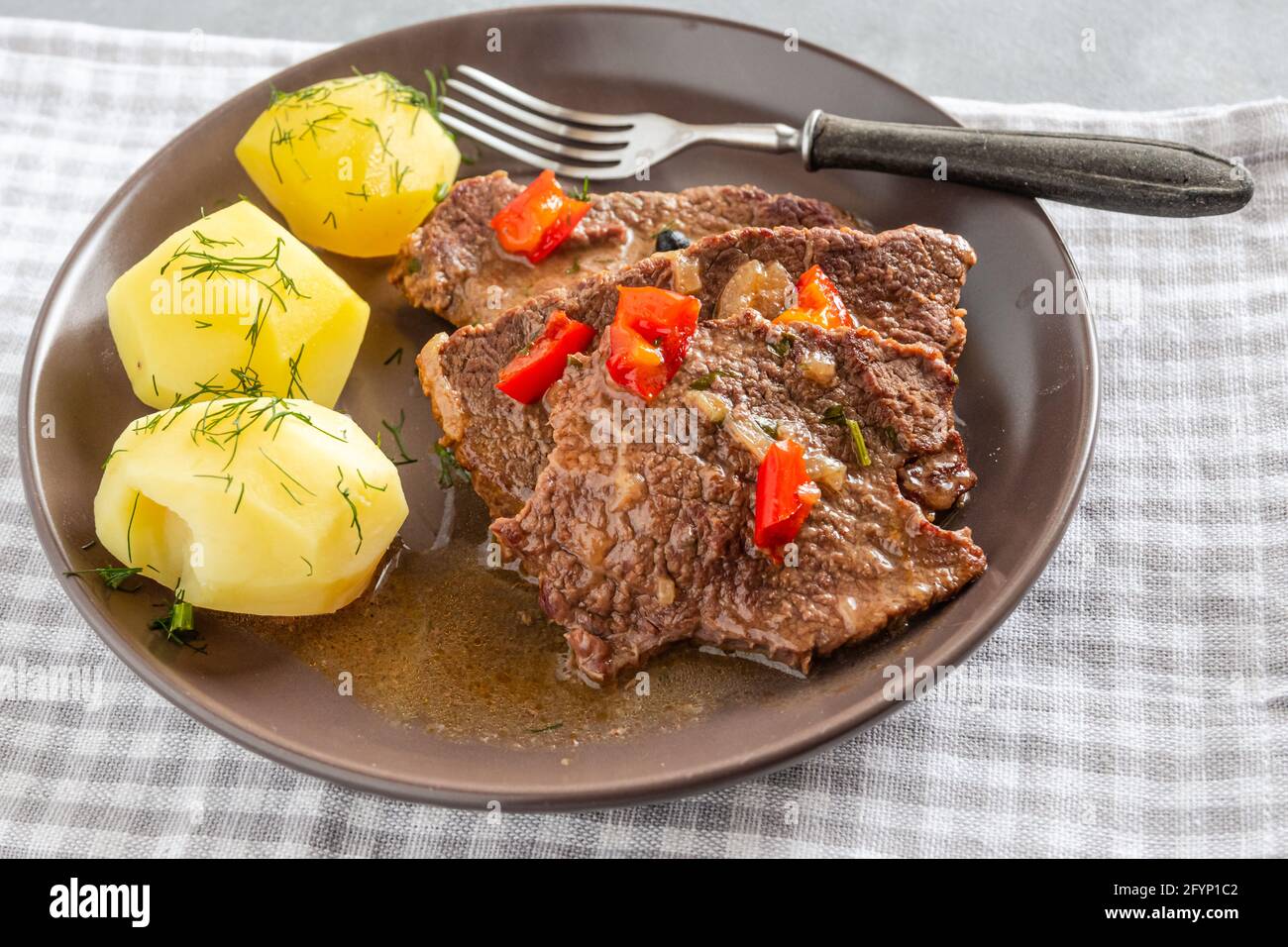 Homemade braised beef with gravy and potatoes Stock Photo - Alamy