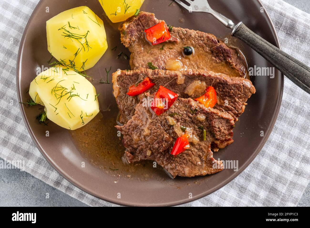 Homemade braised beef with gravy and potatoes Stock Photo - Alamy