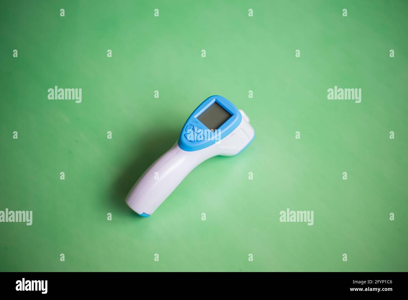 Closeup shot of a thermometer gun, temperature measurement device ...