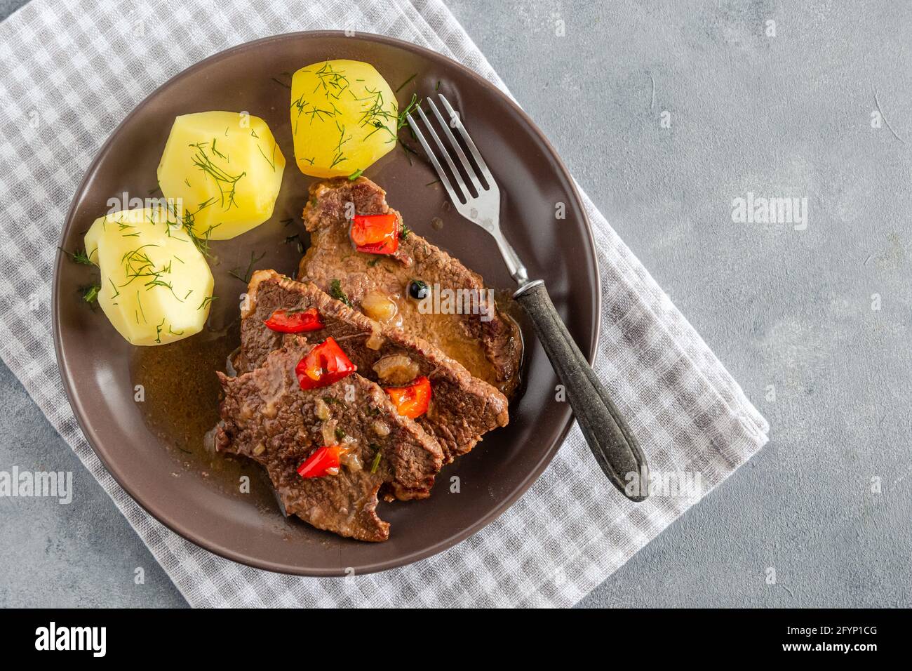 Homemade braised beef with gravy and potatoes Stock Photo - Alamy