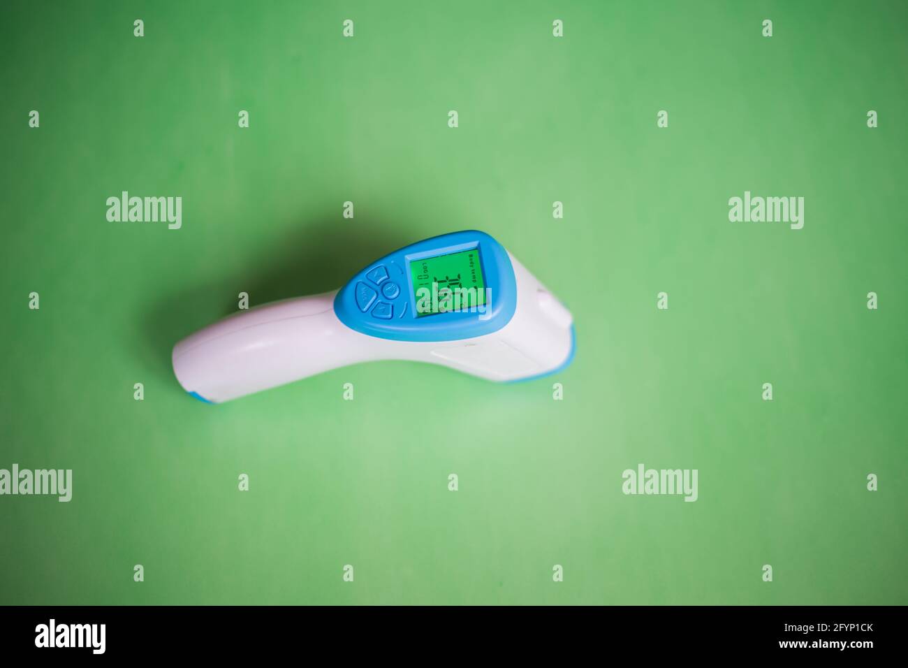 Closeup shot of a thermometer gun, temperature measurement device ...