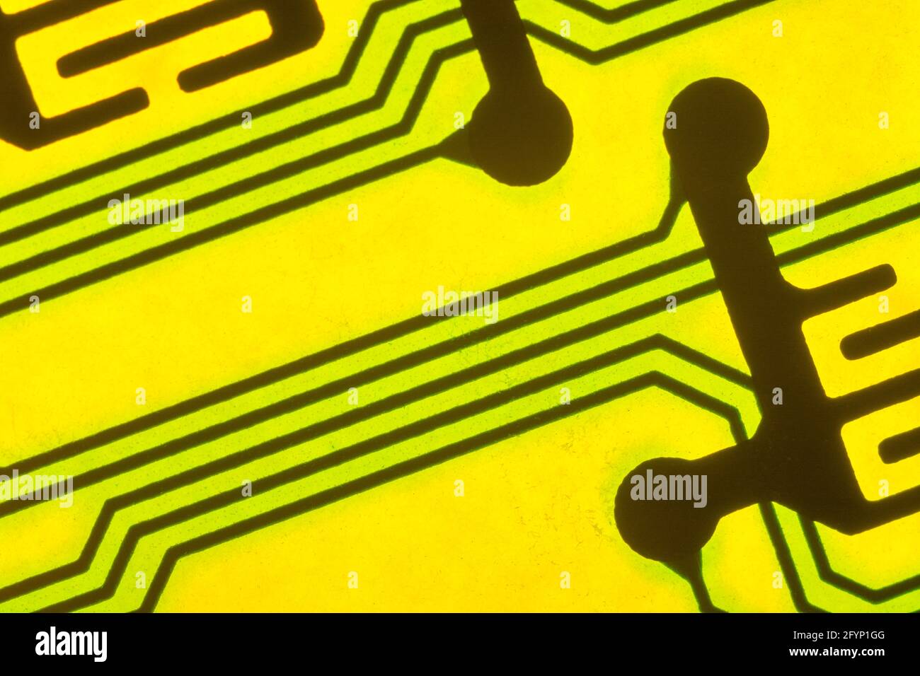 Vibrant coloured abstract macro shot of an opaque printed circuit board ...