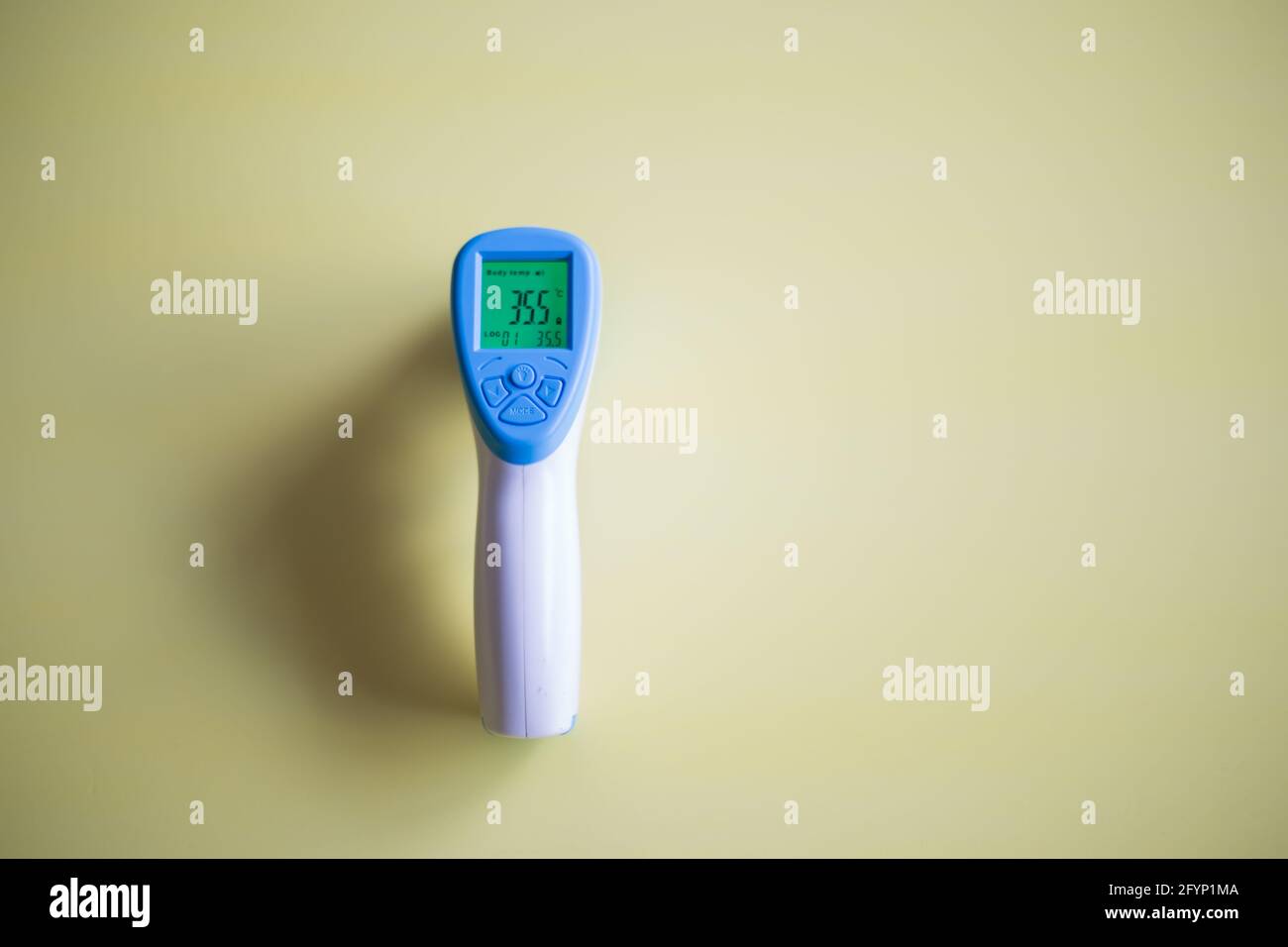 Closeup shot of a thermometer gun, temperature measurement device ...