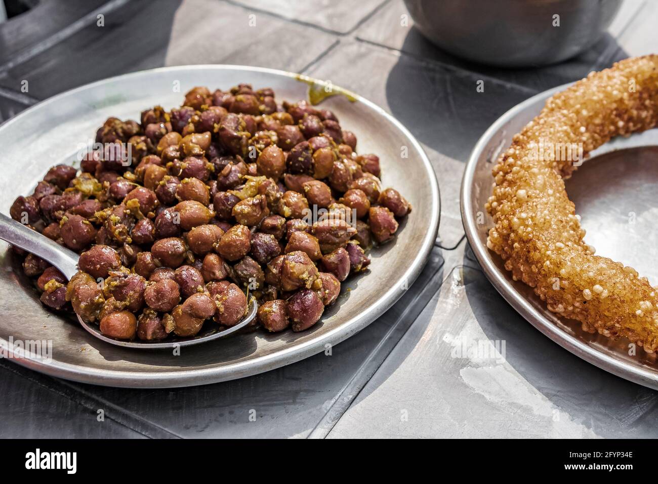 Nepalese food breakfast with Sel Roti and chickpeas. Ring Road in ...