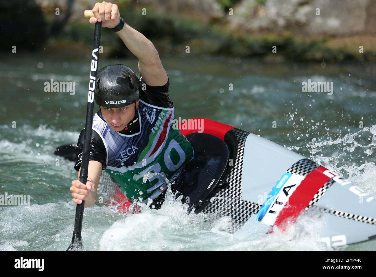 Flavio MICOZZI of Italy competes in the Men's Canoe (C1) semifinals ...