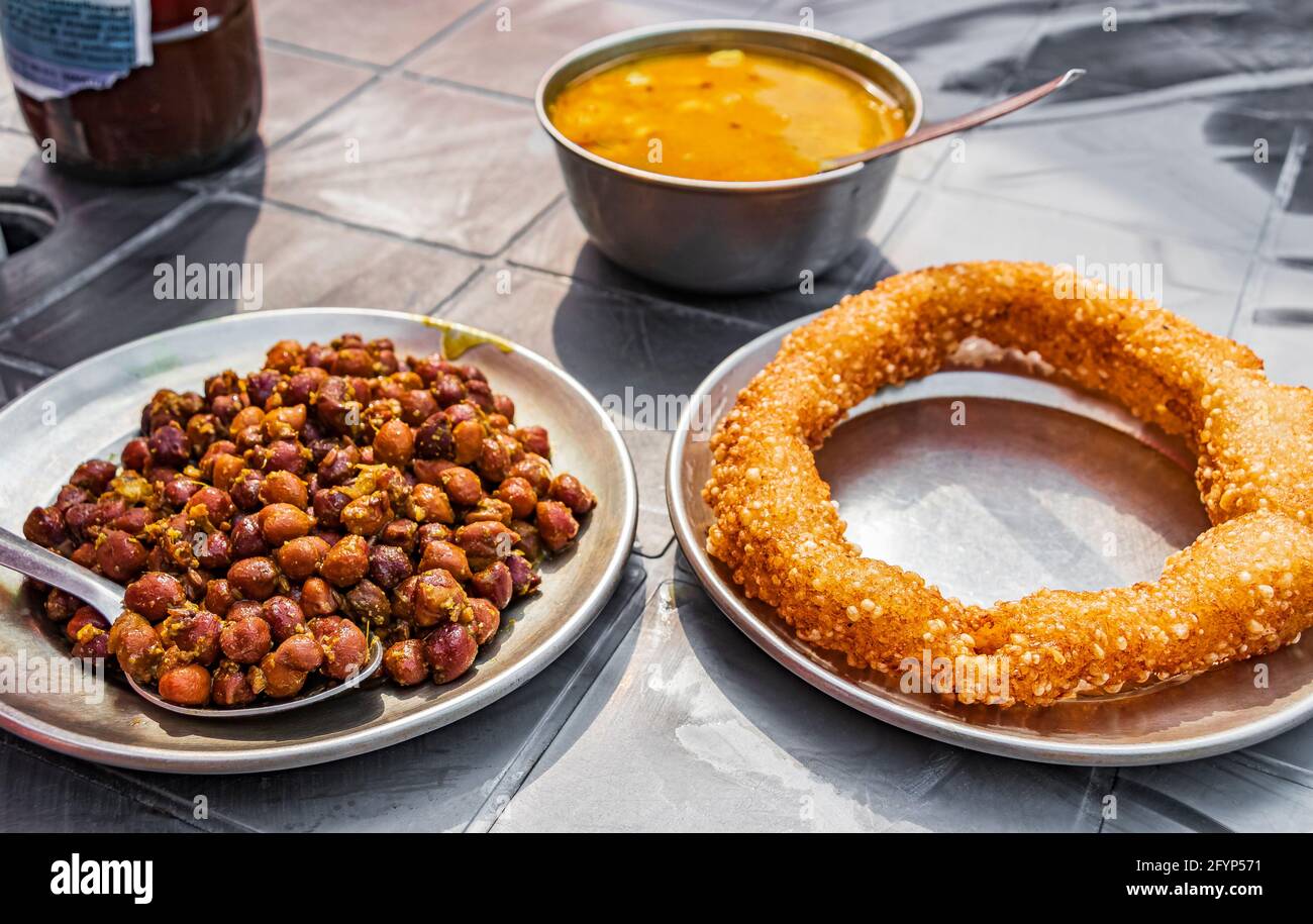 Nepalese food breakfast with Sel Roti and chickpeas. Ring Road in ...