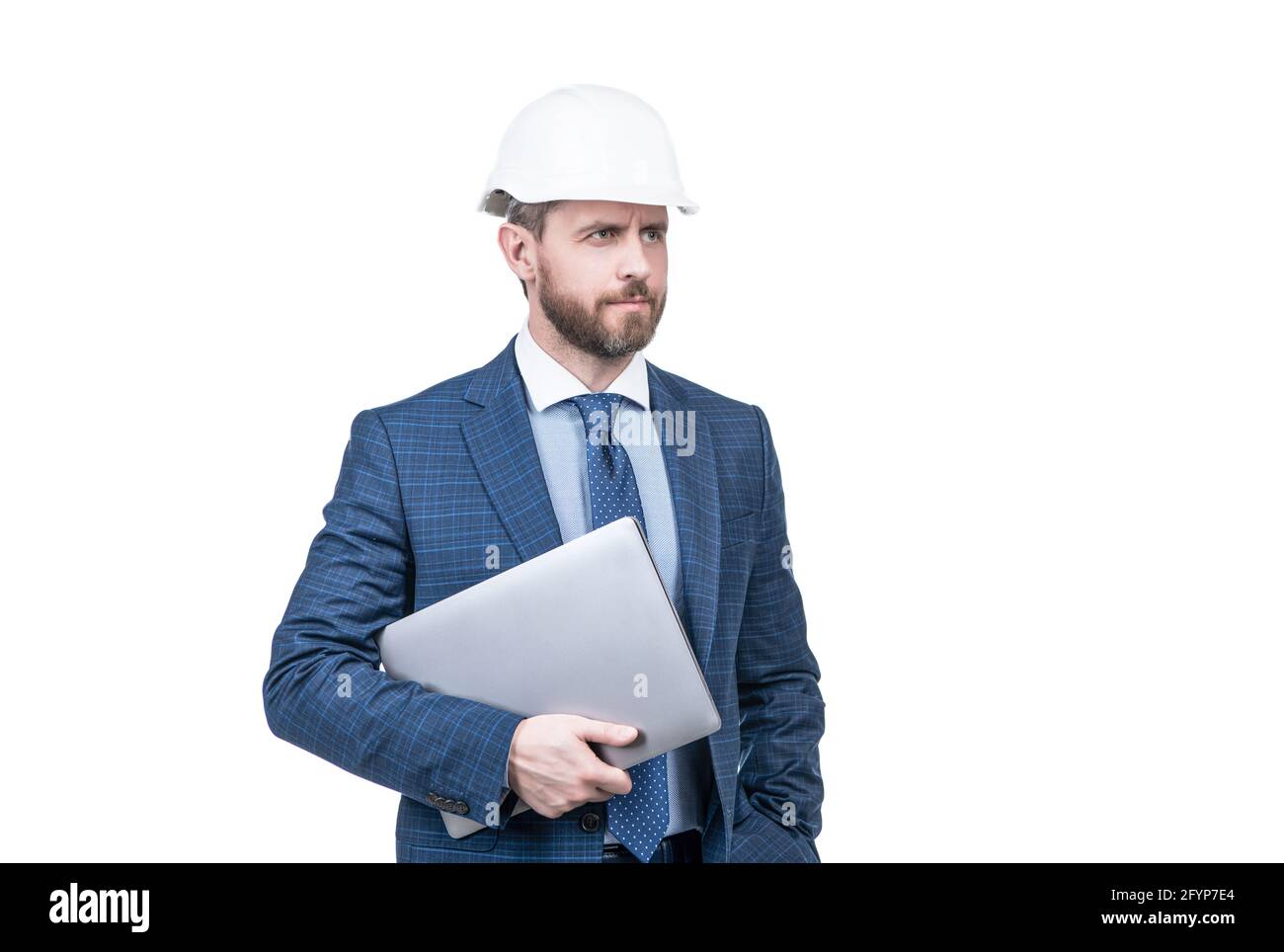 confident businessman man in suit and helmet hold computer isolated on ...