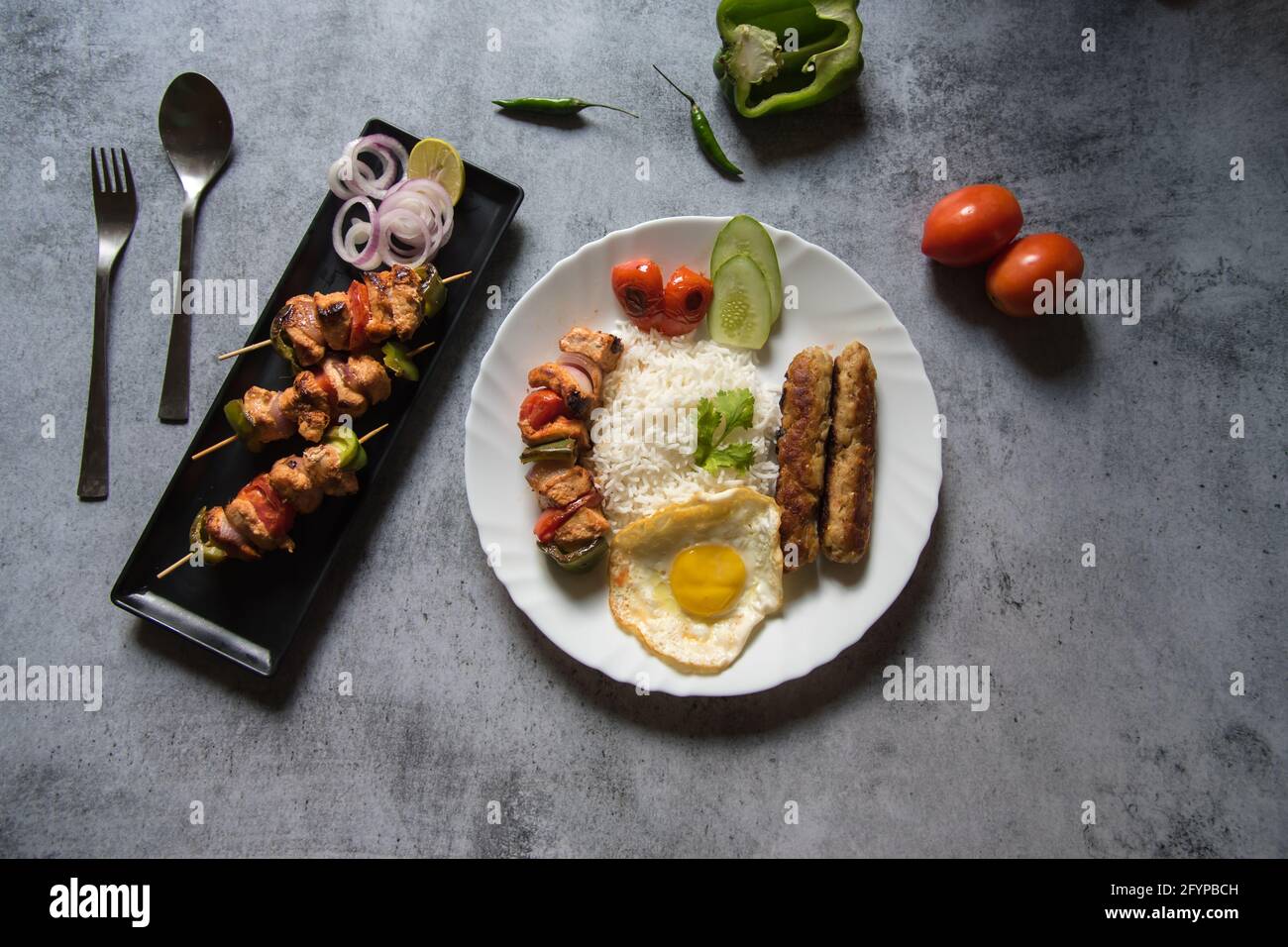 Wholesome meal menu chelo kebab and meat kebabs. Top view. A popular ...