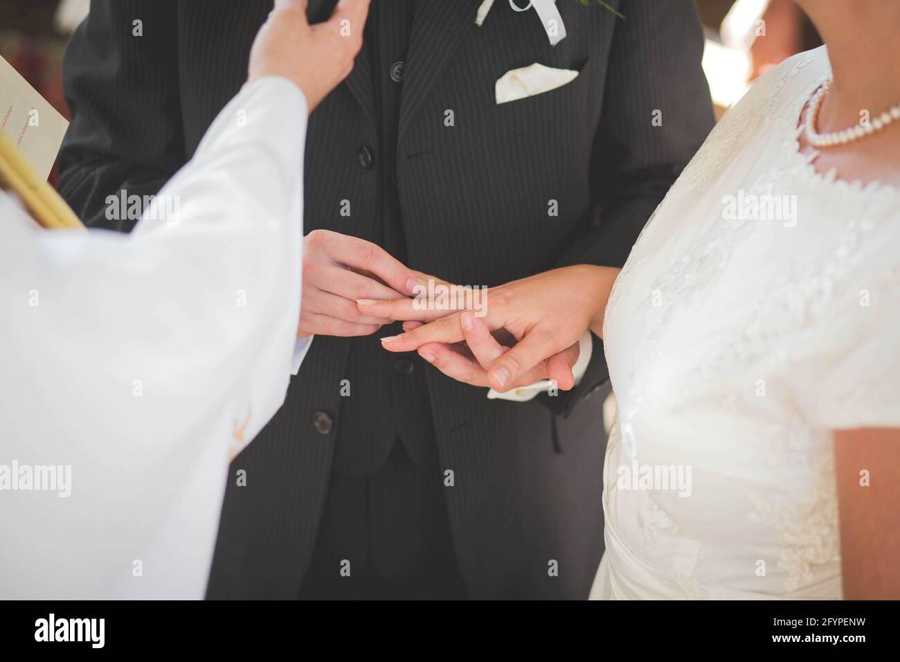 Ceremony of wedding ring exchange Stock Photo - Alamy