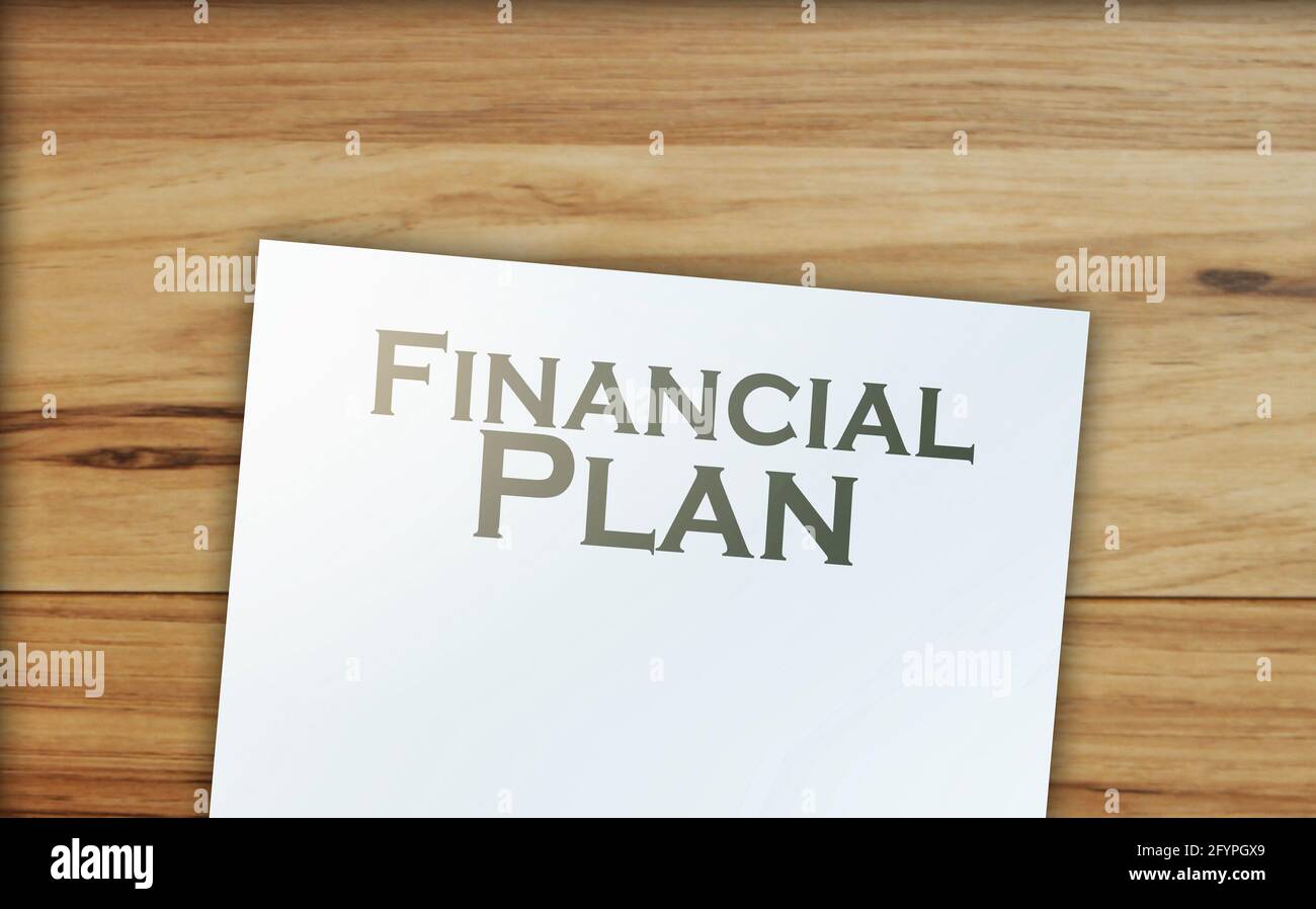 financial plan words on page and paper signs of dollar around. Business ...