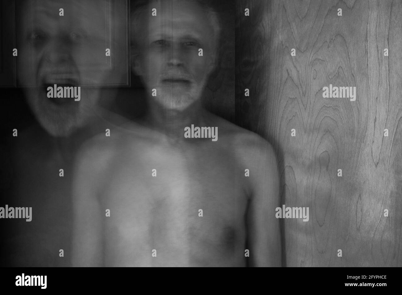 Man with split personalities standing in front of wall Stock Photo - Alamy