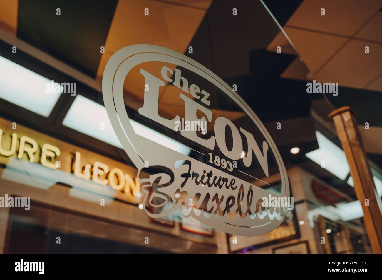 Brussels, Belgium - August 17, 2019: Name sign inside Chez Leon, a ...