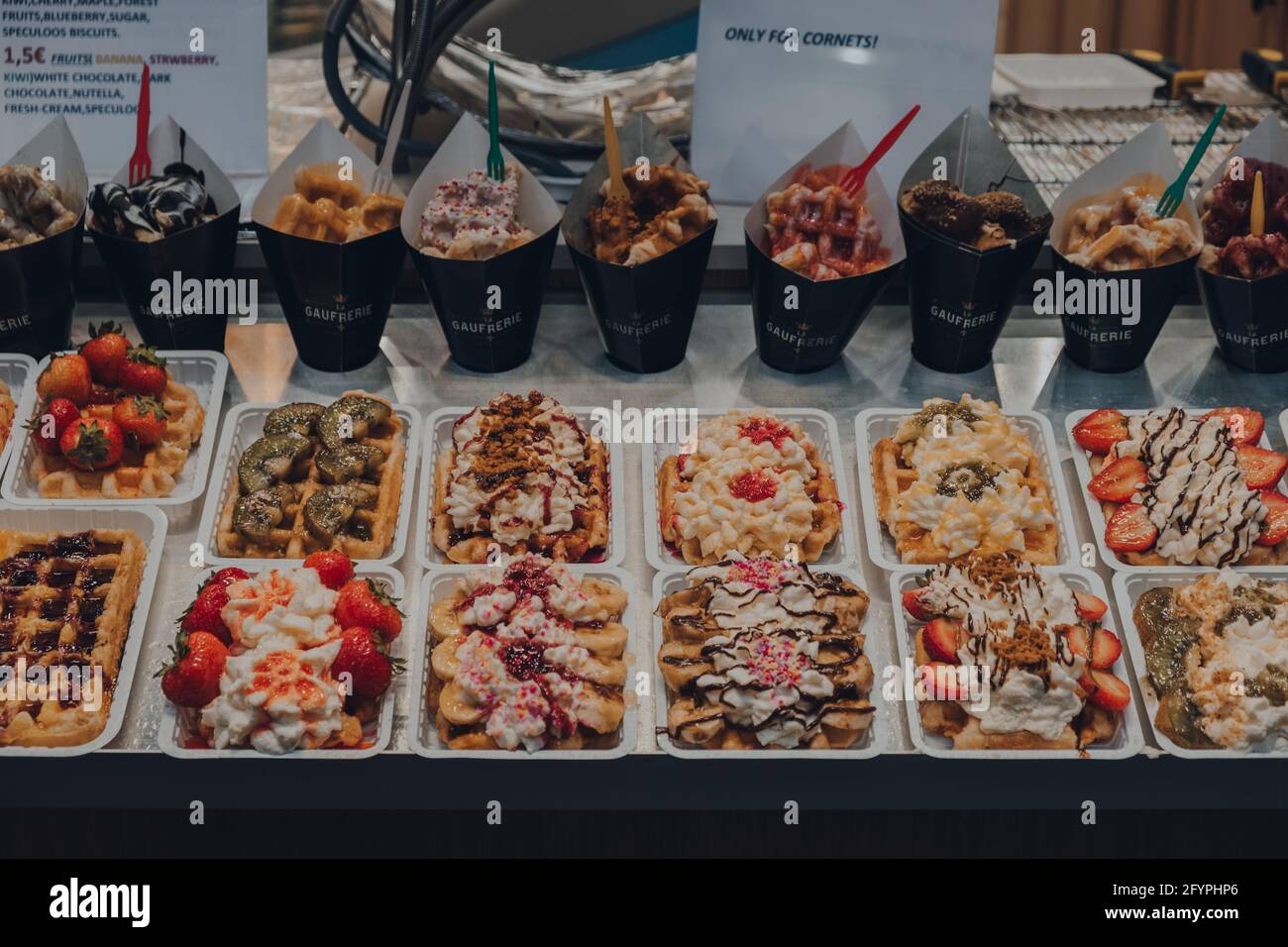 Brussels, Belgium - August 17, 2019: Belgian waffles with a variety of ...