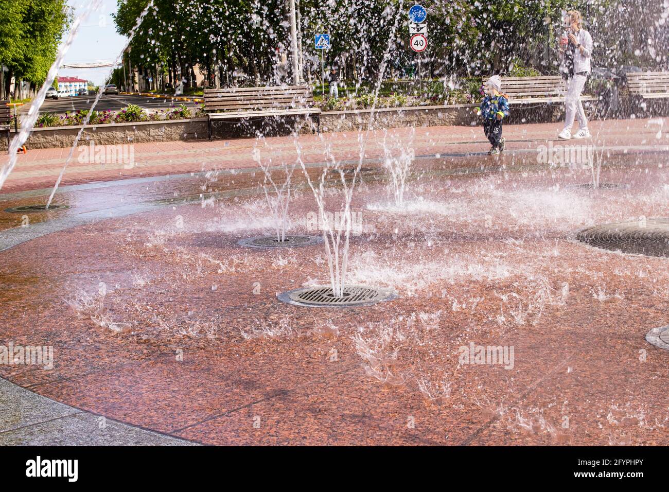 BELARUS, POLOTSK - 25 MAY, 2021: People at the fountain in city Stock ...