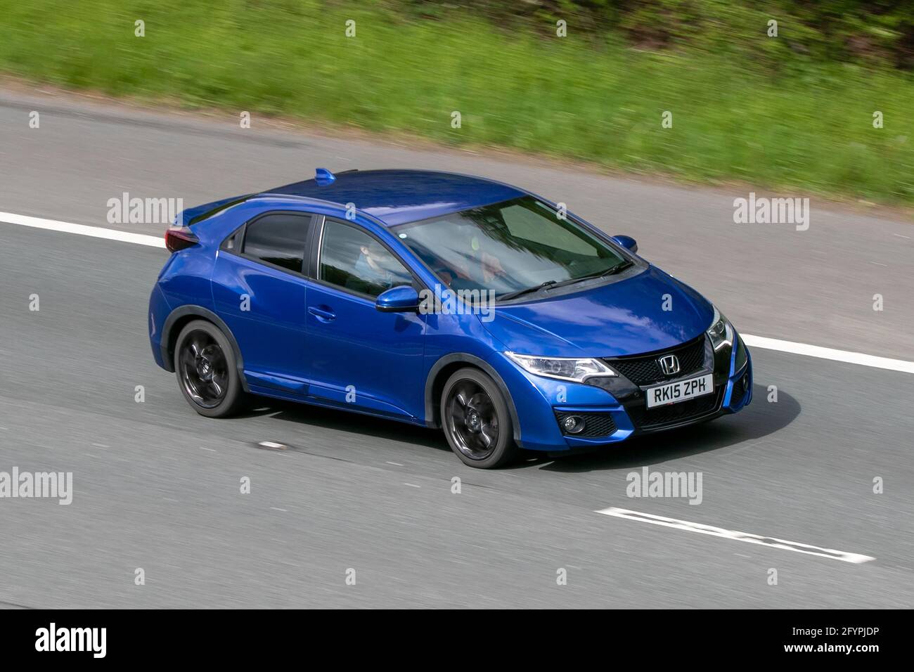 Honda blue car highway hi-res stock photography and images - Alamy